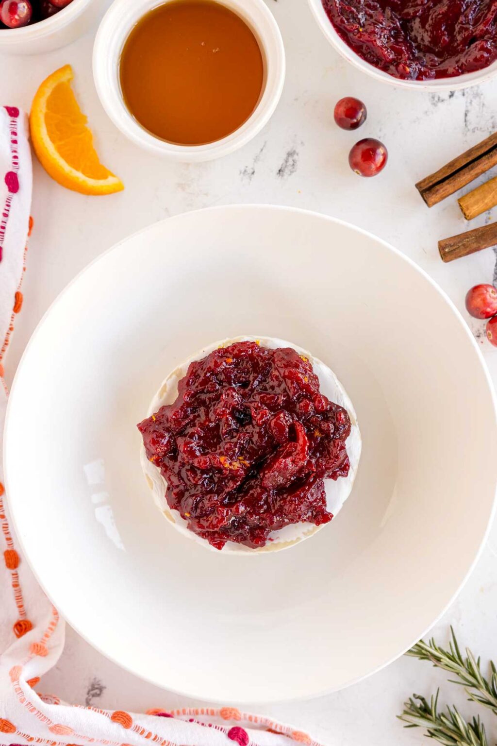 Easy Baked Brie with Honey and Cranberry Sauce