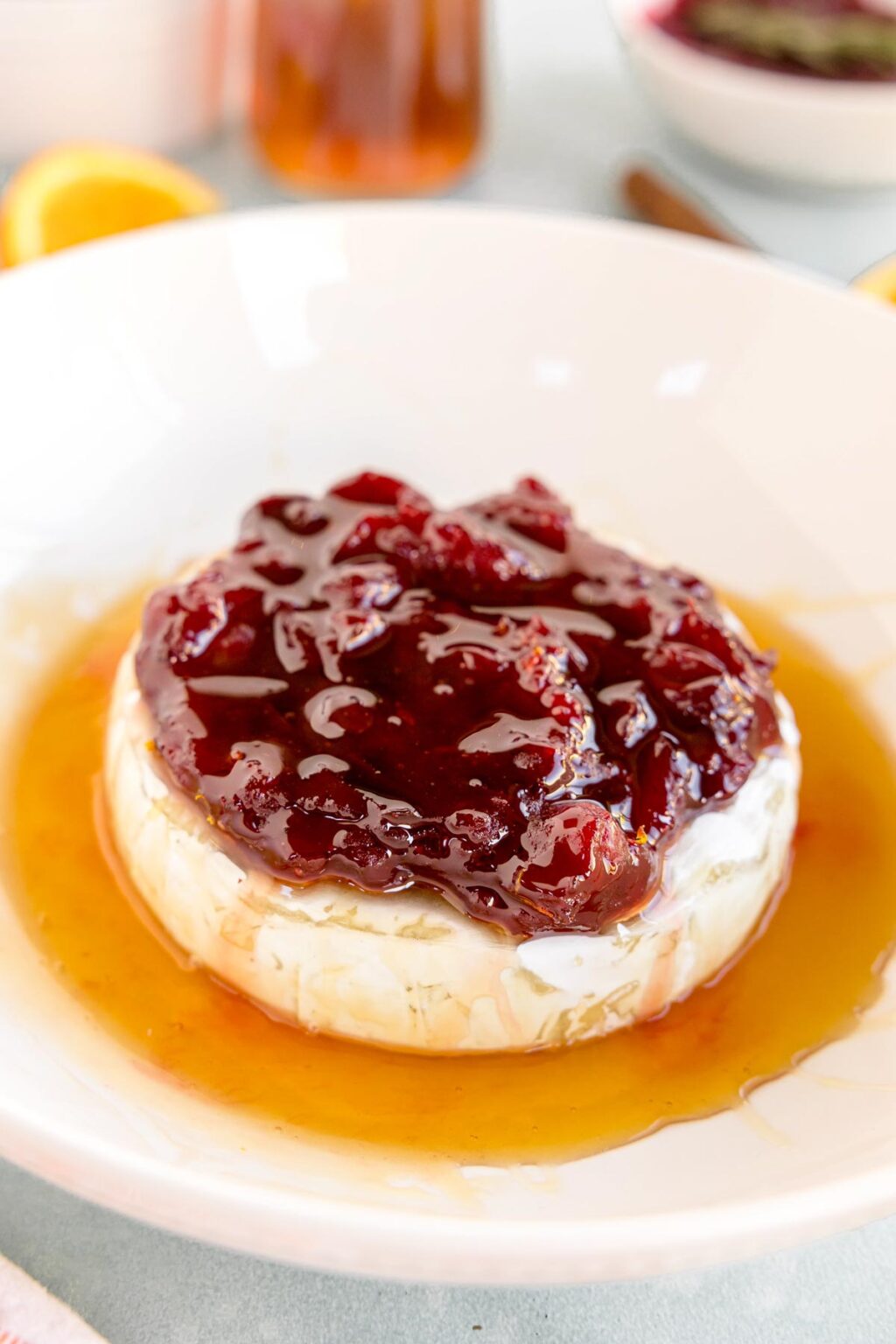 Easy Baked Brie with Honey and Cranberry Sauce